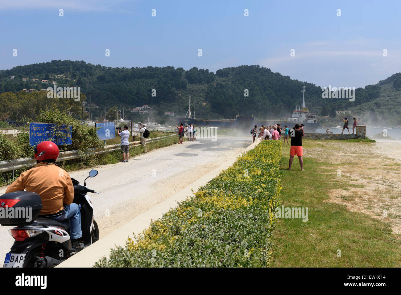Aviation enthusiasts on a public road get jet blasted from a departing ...
