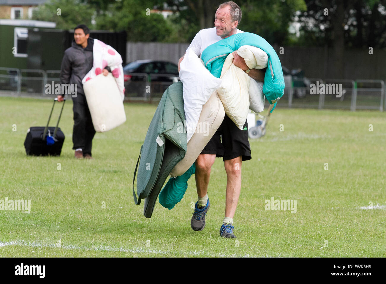 Wimbledon, London, UK. 28th June, 2015. First queuers arrive with their ...