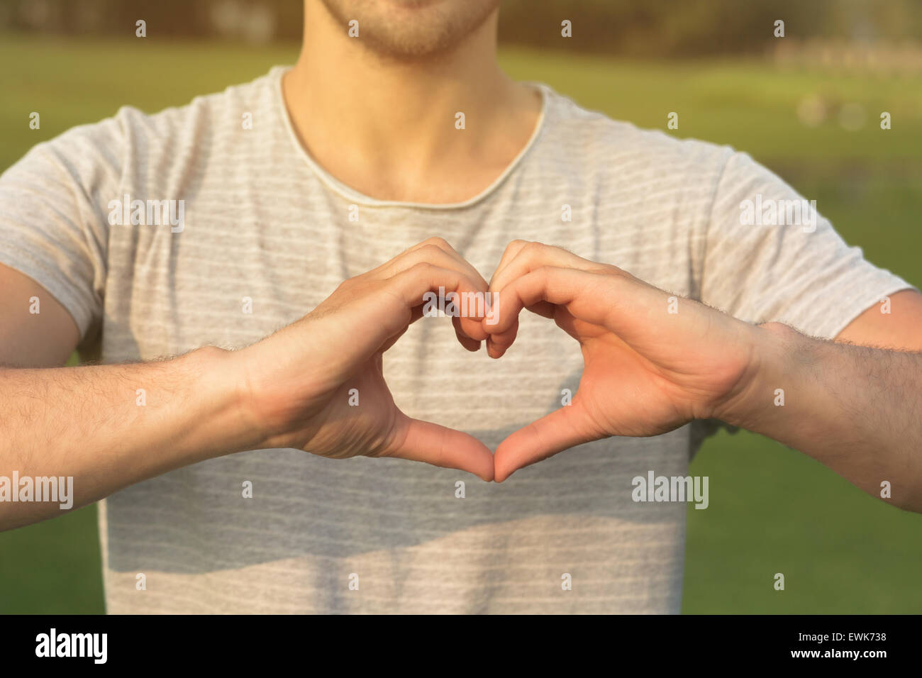 Heart with hands Stock Photo - Alamy