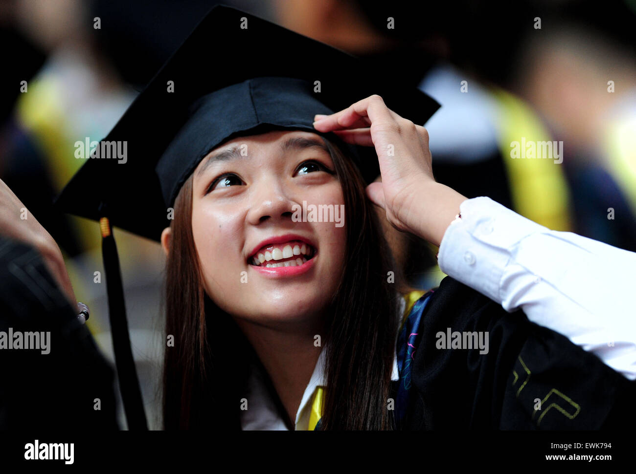 Shenyang, China's Liaoning Province. 28th June, 2015. A graduate sheds ...