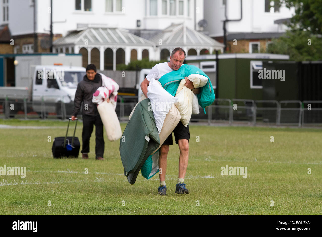 Wimbledon, London, UK. 28th June, 2015. First queuers arrive with their ...