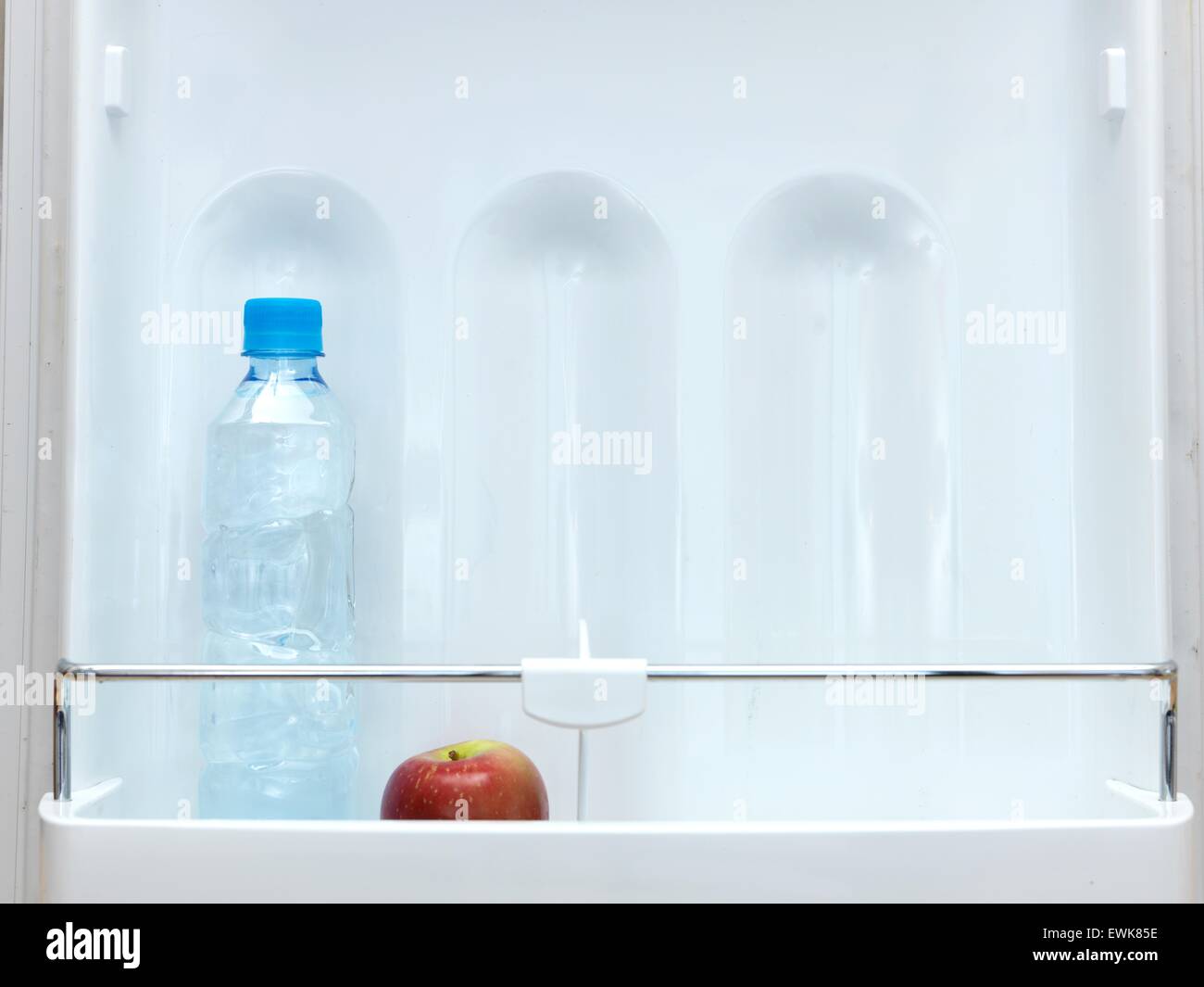 A shot of an open bar fridge Stock Photo - Alamy