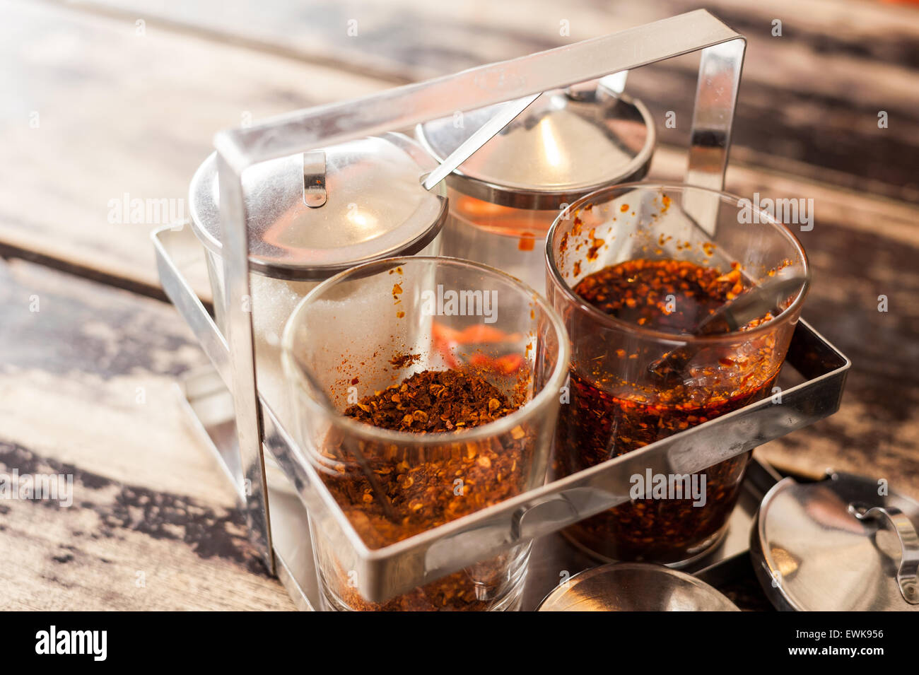 Thai condiment pepper, Sugar and fish sauce for noodle Stock Photo - Alamy