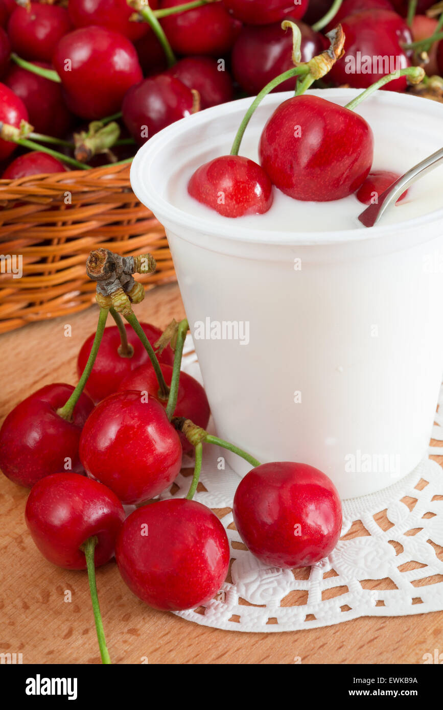 low-fat plain yogurt creamy cherries flavor Stock Photo - Alamy