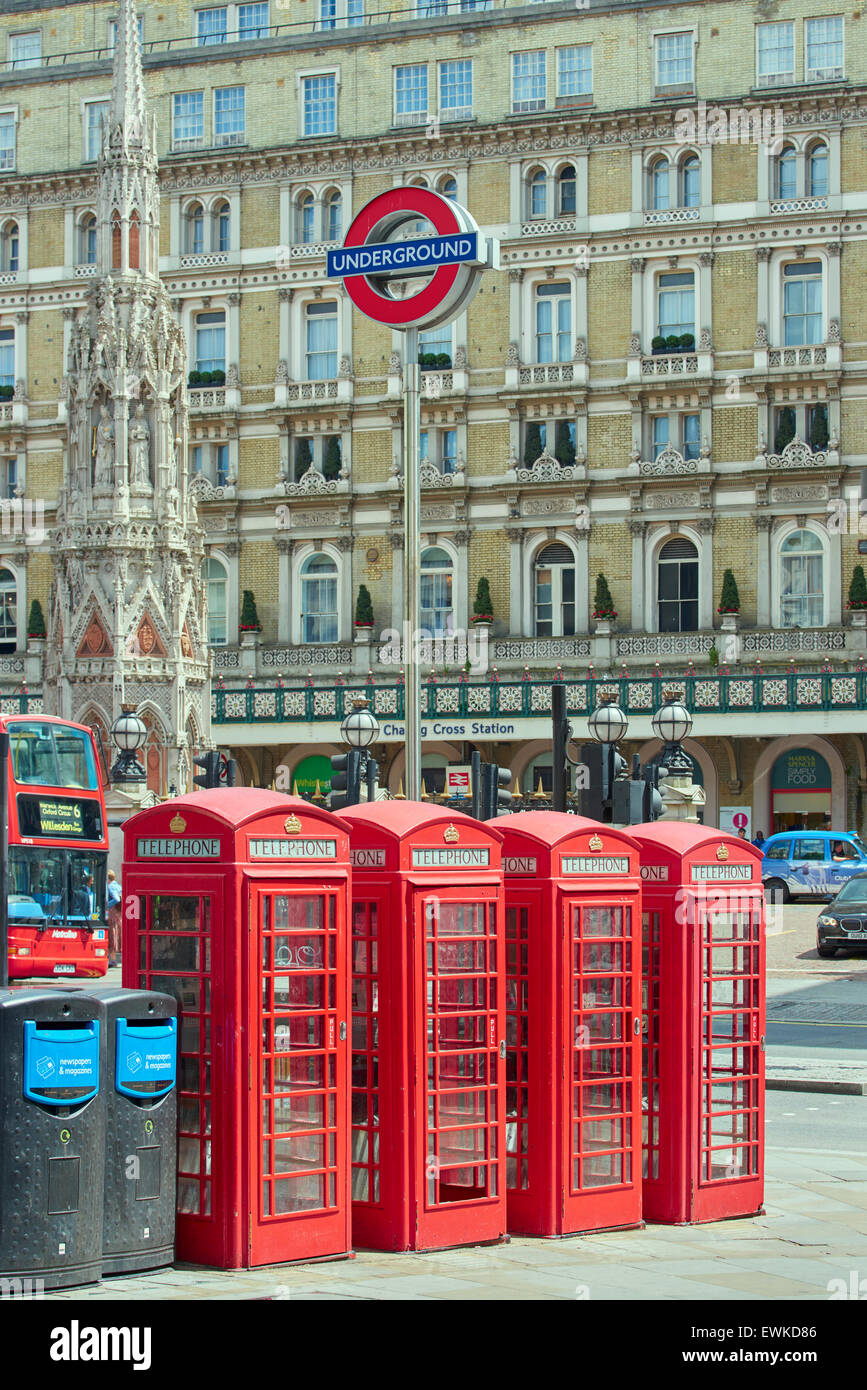 LONDON, UK - JUNE 15: Four traditional red phone booth with underground ...