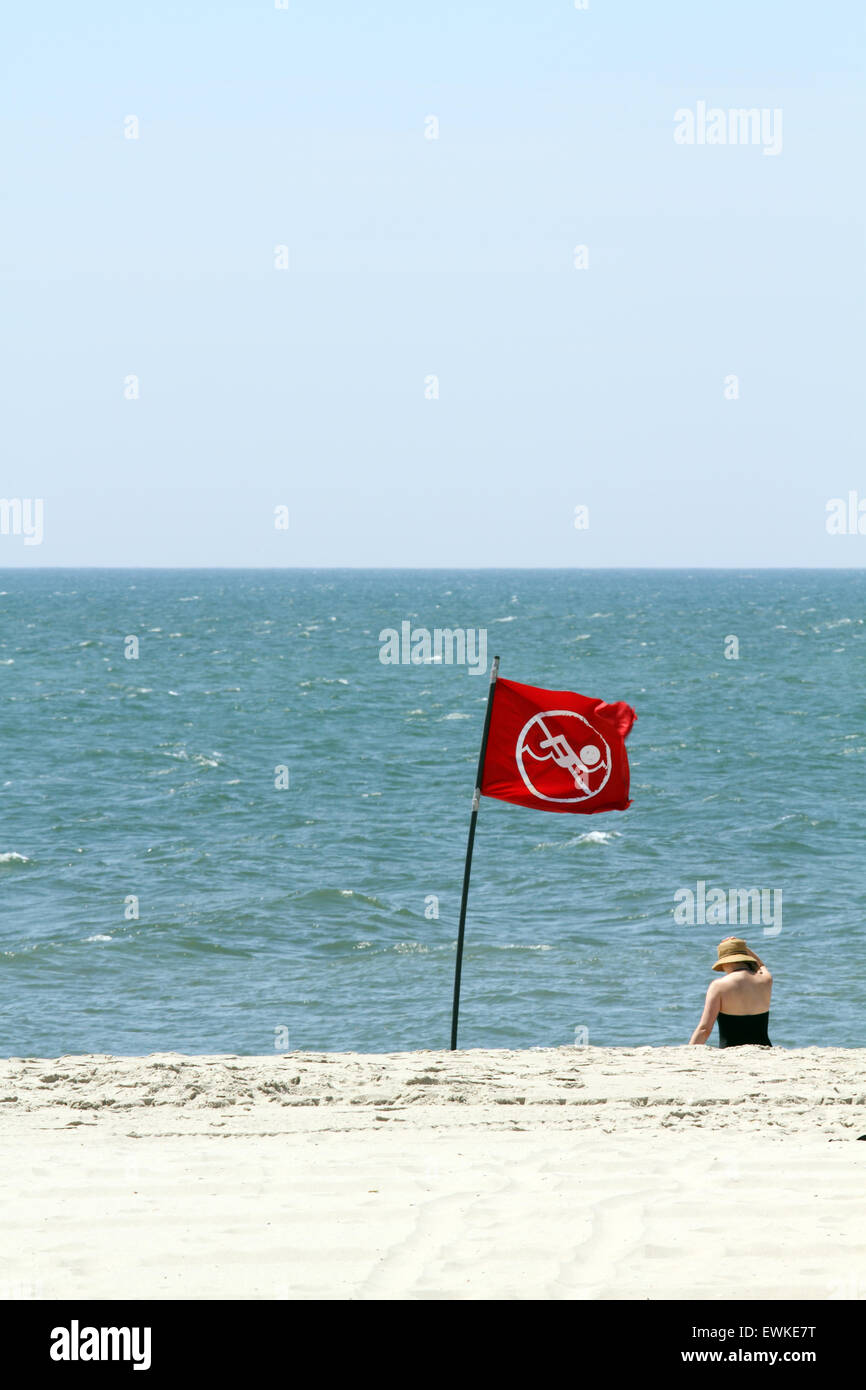 A No Swimming Flag on the beach in Cape May, New Jersey, USA Stock ...