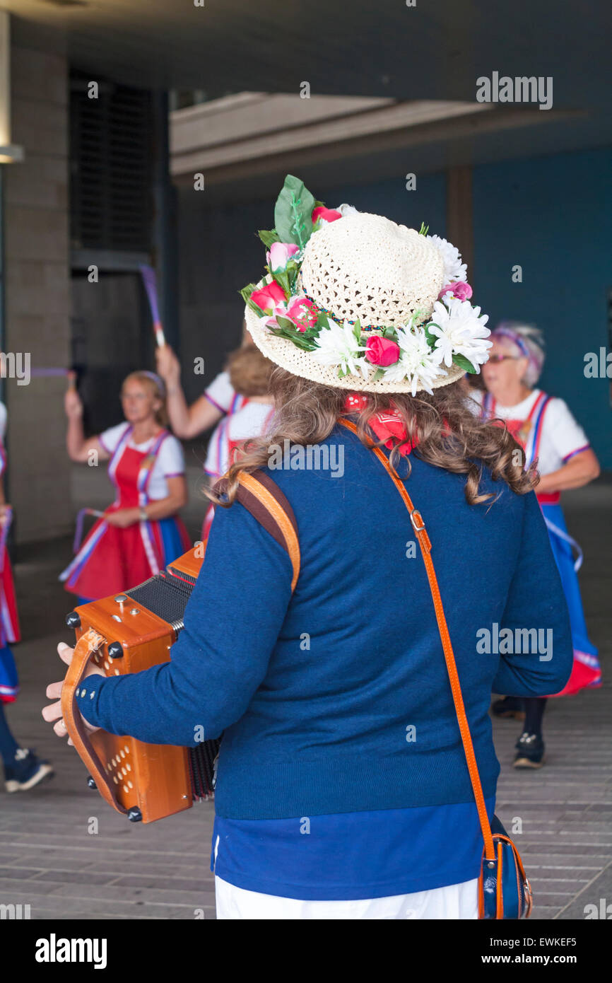 Women dancing playing musical instruments hi-res stock photography and ...