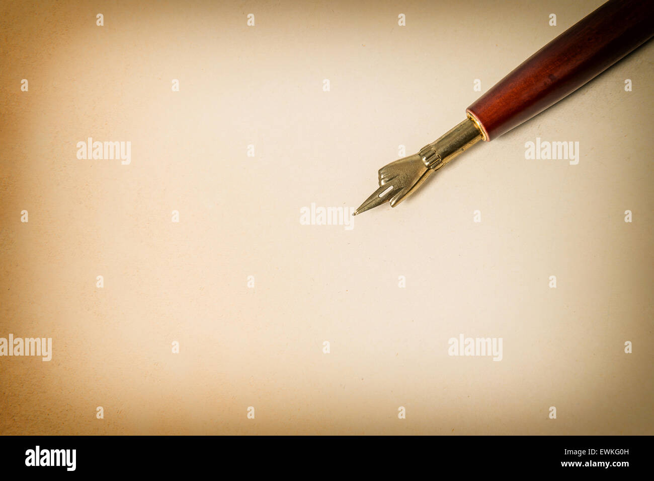 Antique ink pen on grungy paper texture. Vintage background with space ...