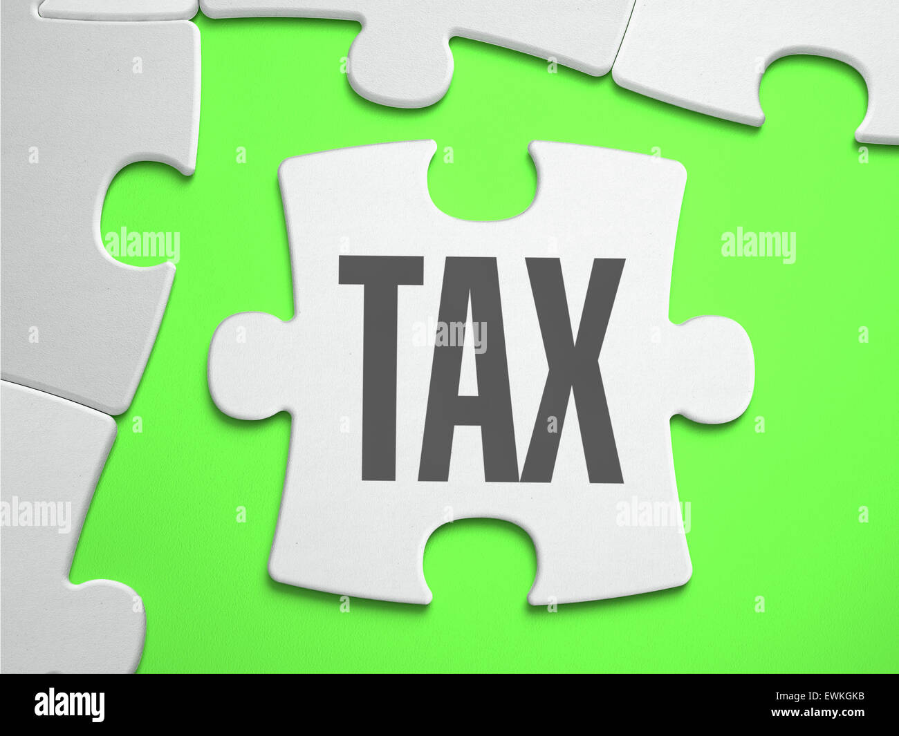 Tax - Jigsaw Puzzle with Missing Pieces Stock Photo - Alamy