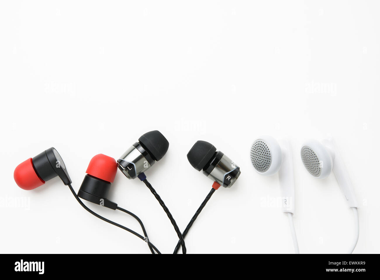 earbuds on white background Stock Photo - Alamy