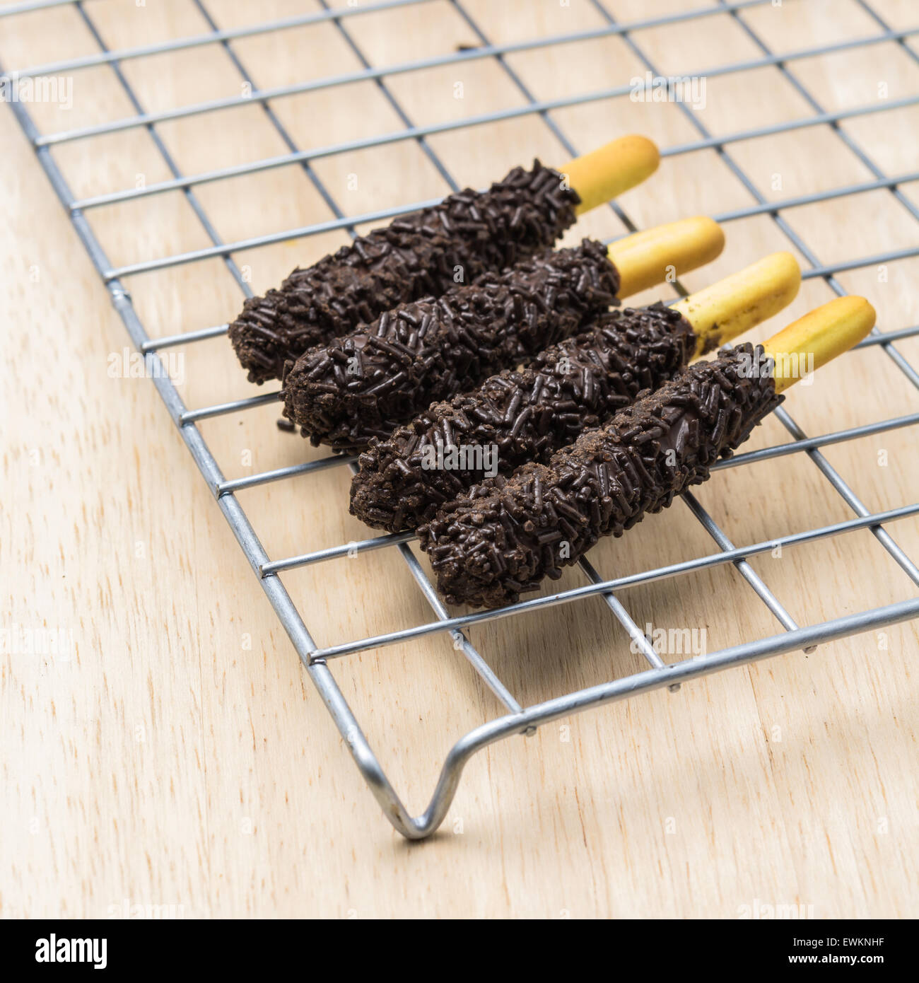 Sweet bread sticks Chocolate on wooden background Stock Photo - Alamy