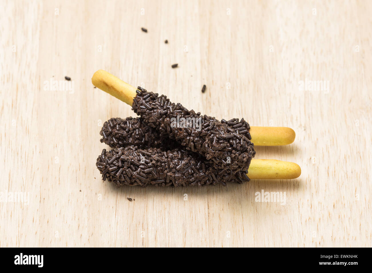 Sweet bread sticks Chocolate on wooden background Stock Photo - Alamy
