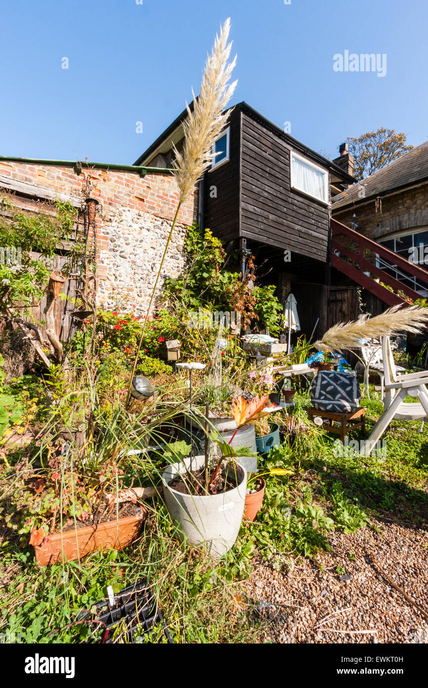 House with connected barn and stable with rambling overgrown garden in ...