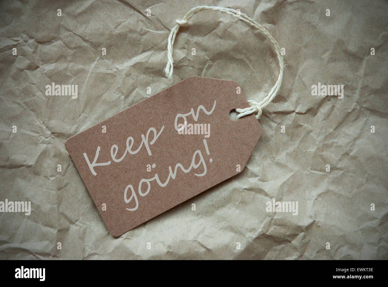 Beige Label Quote Keep On Going Paper Background Stock Photo - Alamy