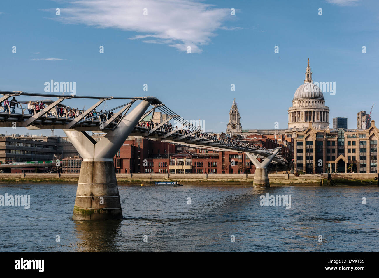People walking on millennium bridge london hi-res stock photography and ...