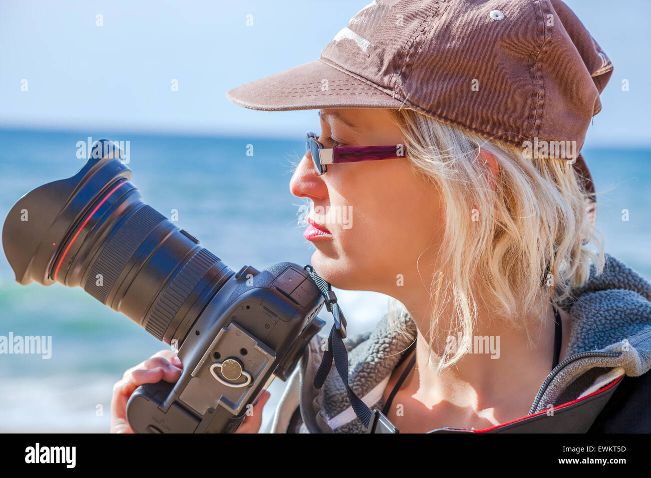 Photographer with camera Stock Photo - Alamy