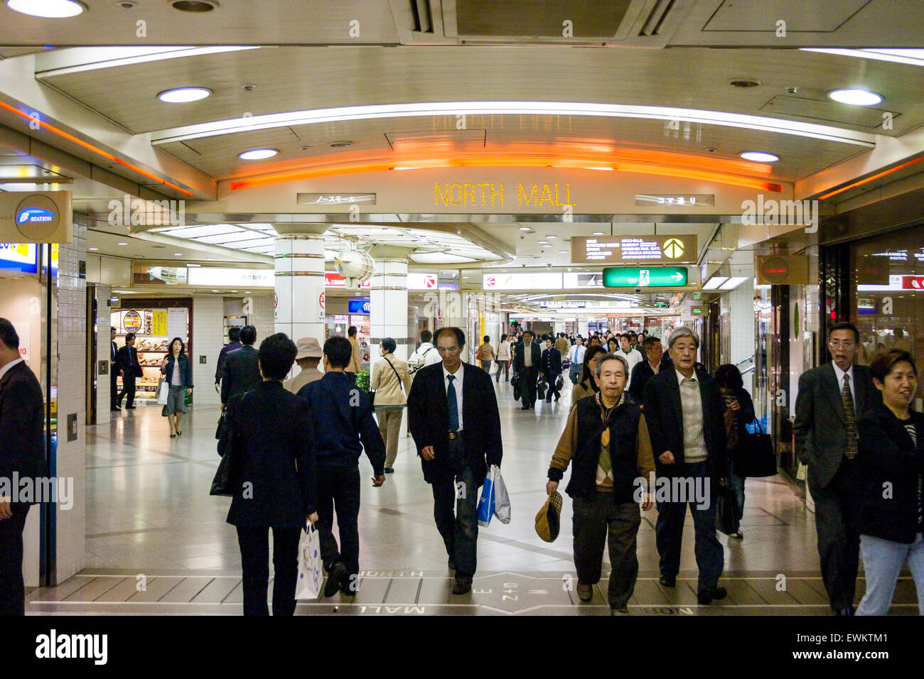 Shopping mall under the stations at Umeda in Osaka, Japan. View along a ...
