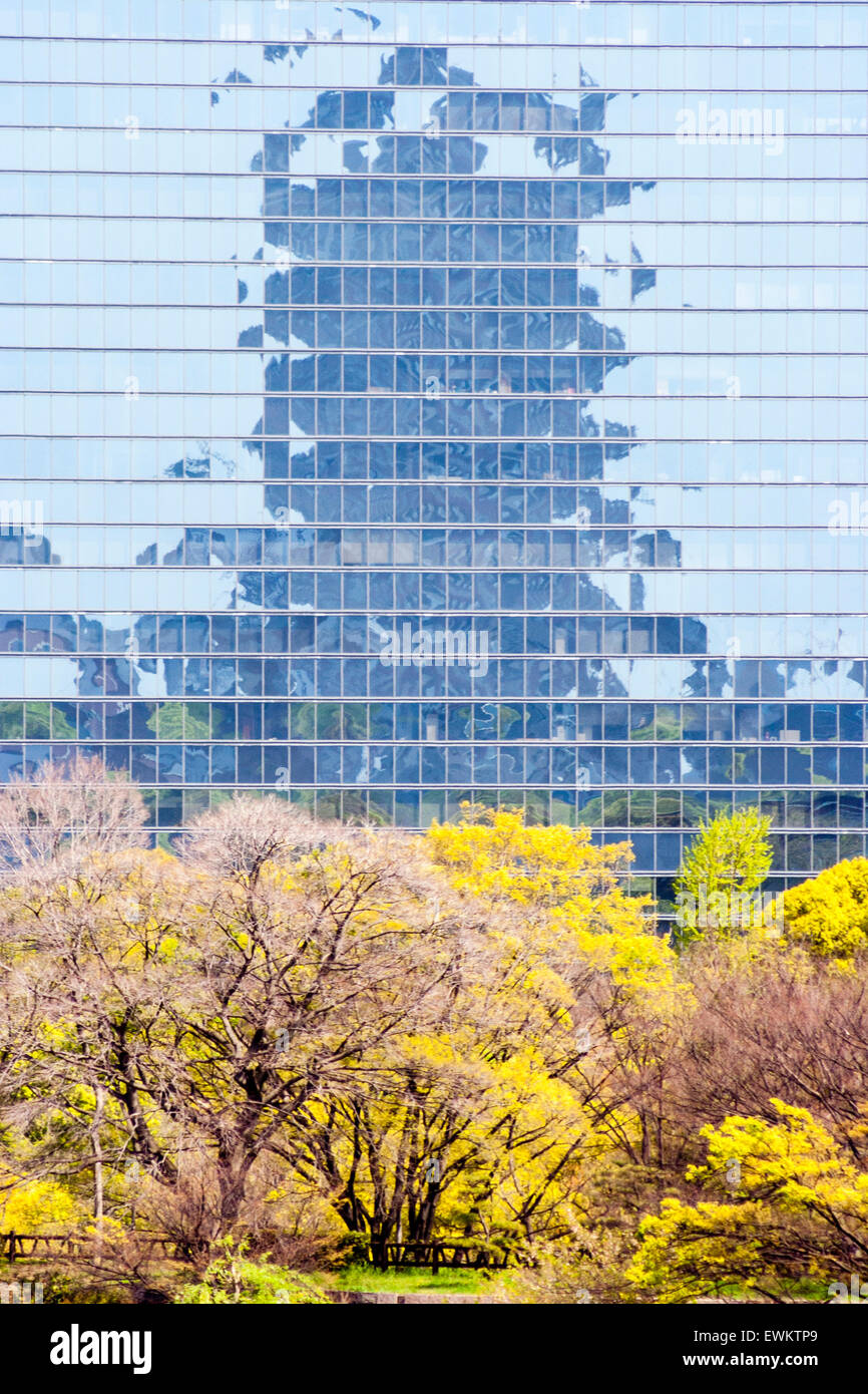 All reflective glass office block in Osaka near the castle with ...