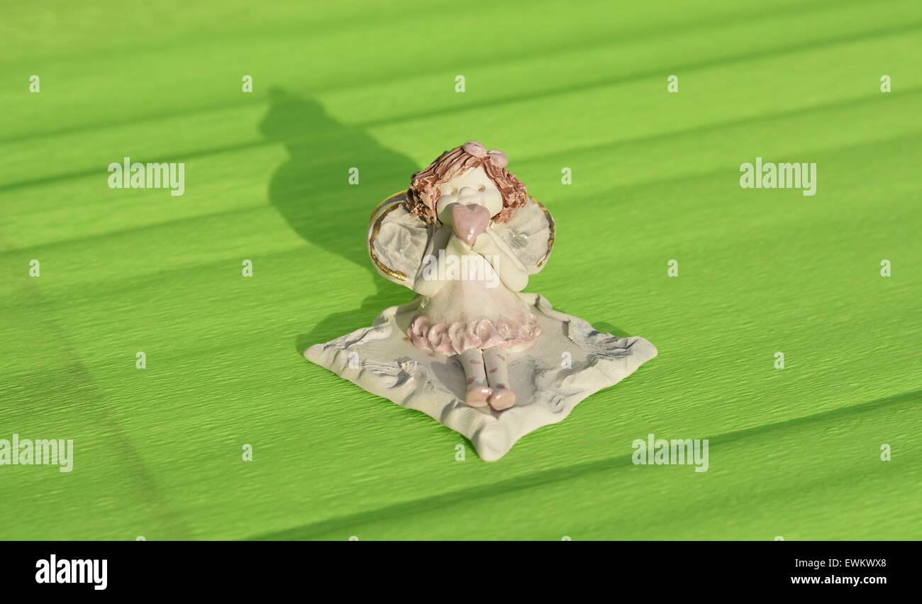 Fairy with a heart Stock Photo - Alamy
