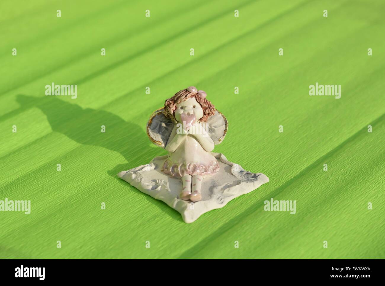 Fairy with a heart Stock Photo - Alamy