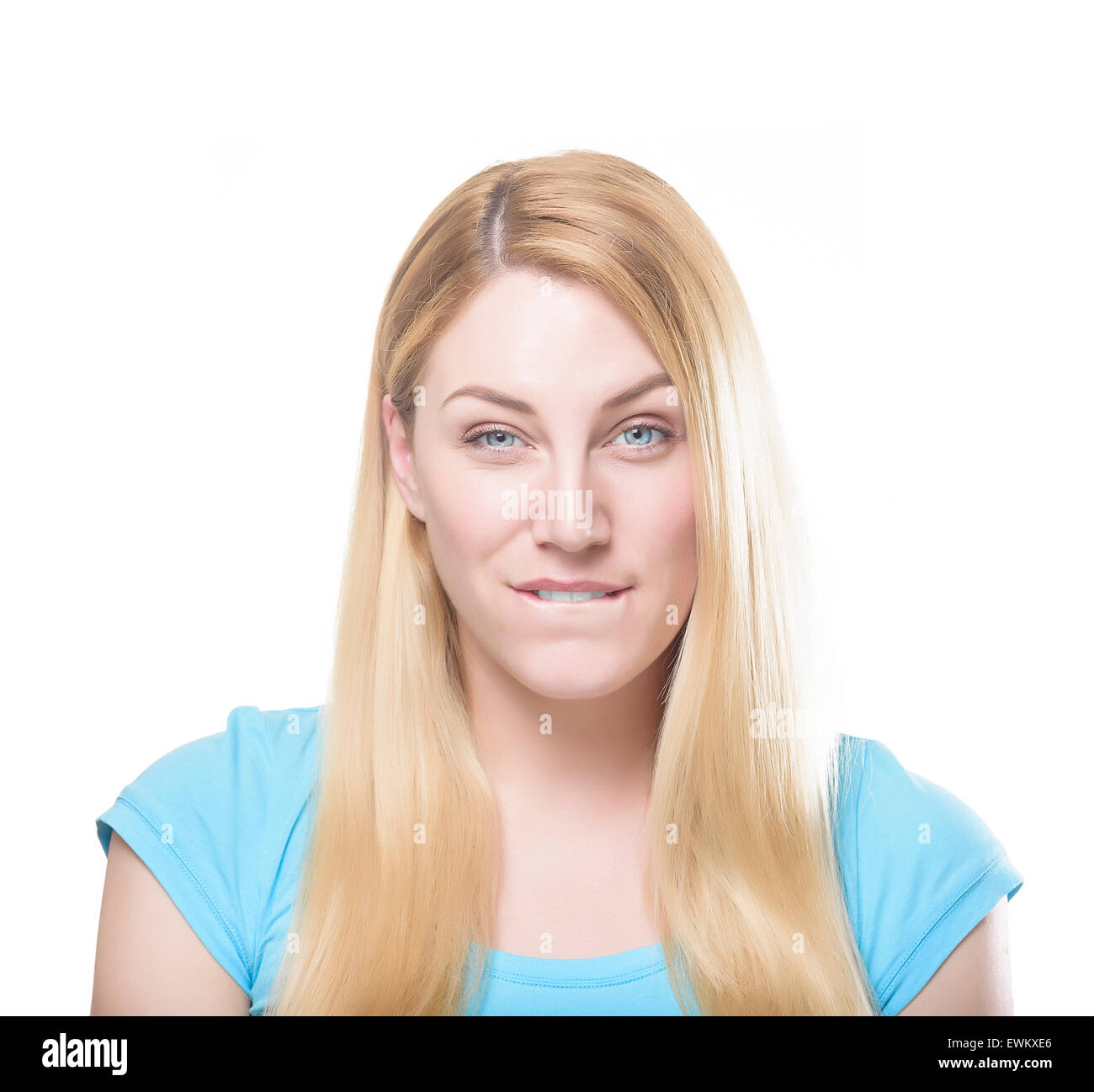 Blond woman bit her lip Stock Photo - Alamy