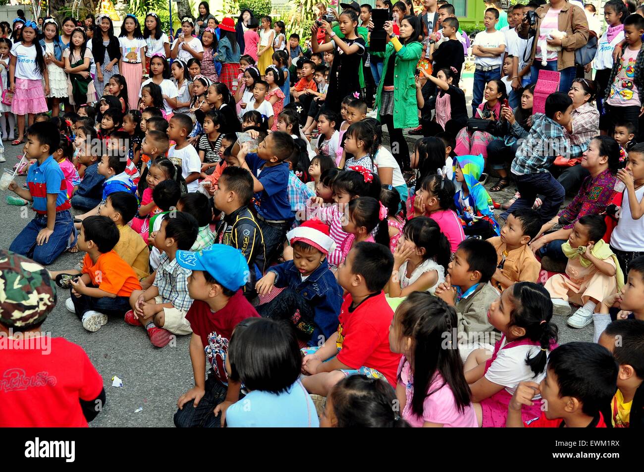 Chiang Mai, Thailand: A rapt audience of school children watching a ...