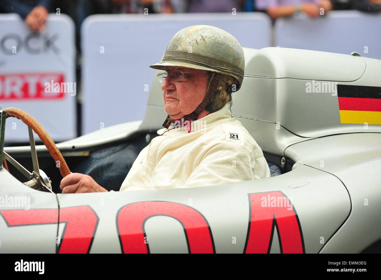 Racing driver Hans Hermann driving a Mercedes-Benz 300 SLR at the ...