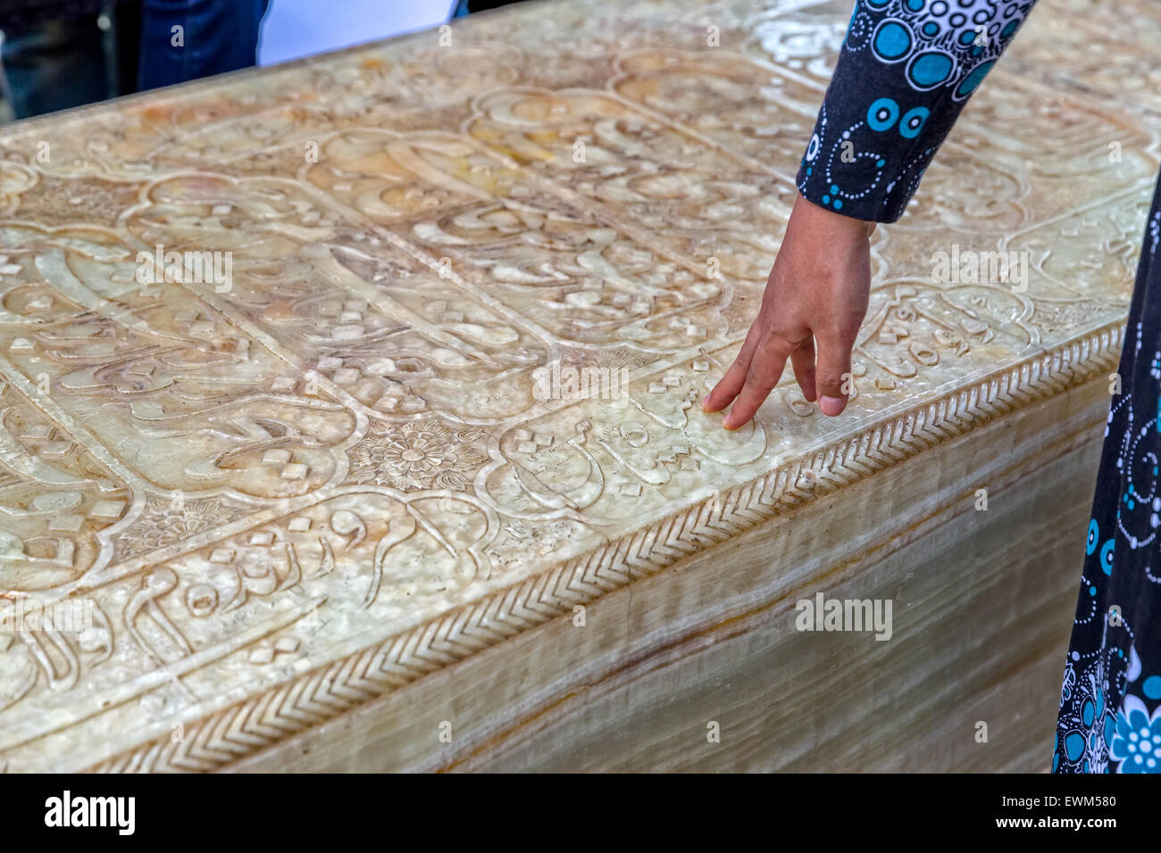 Female tourist touching historic stone hi-res stock photography and ...