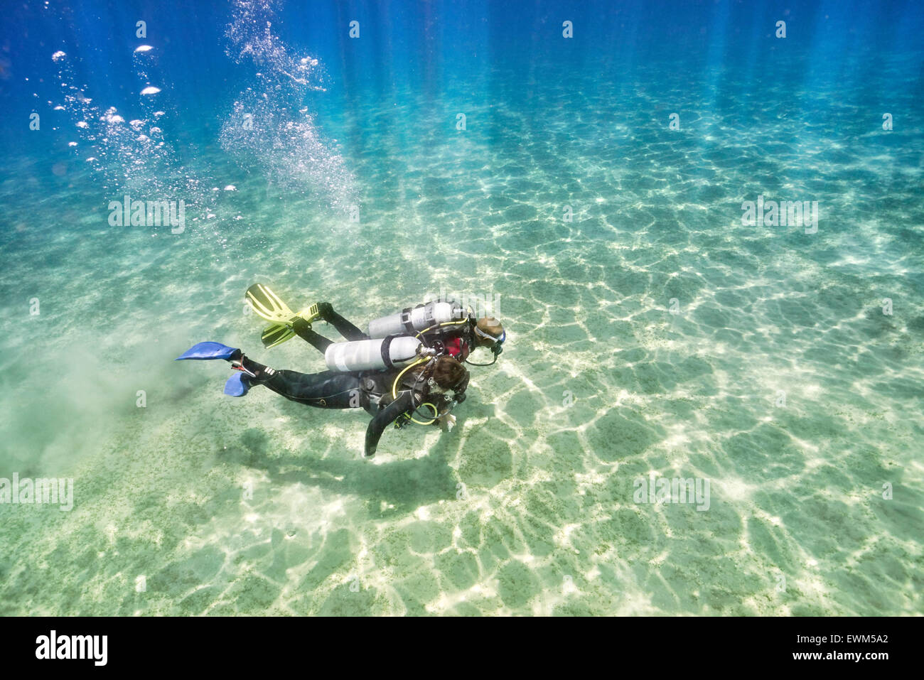 Marsa Alam, dive instructor with novice diver, first underwater dive ...