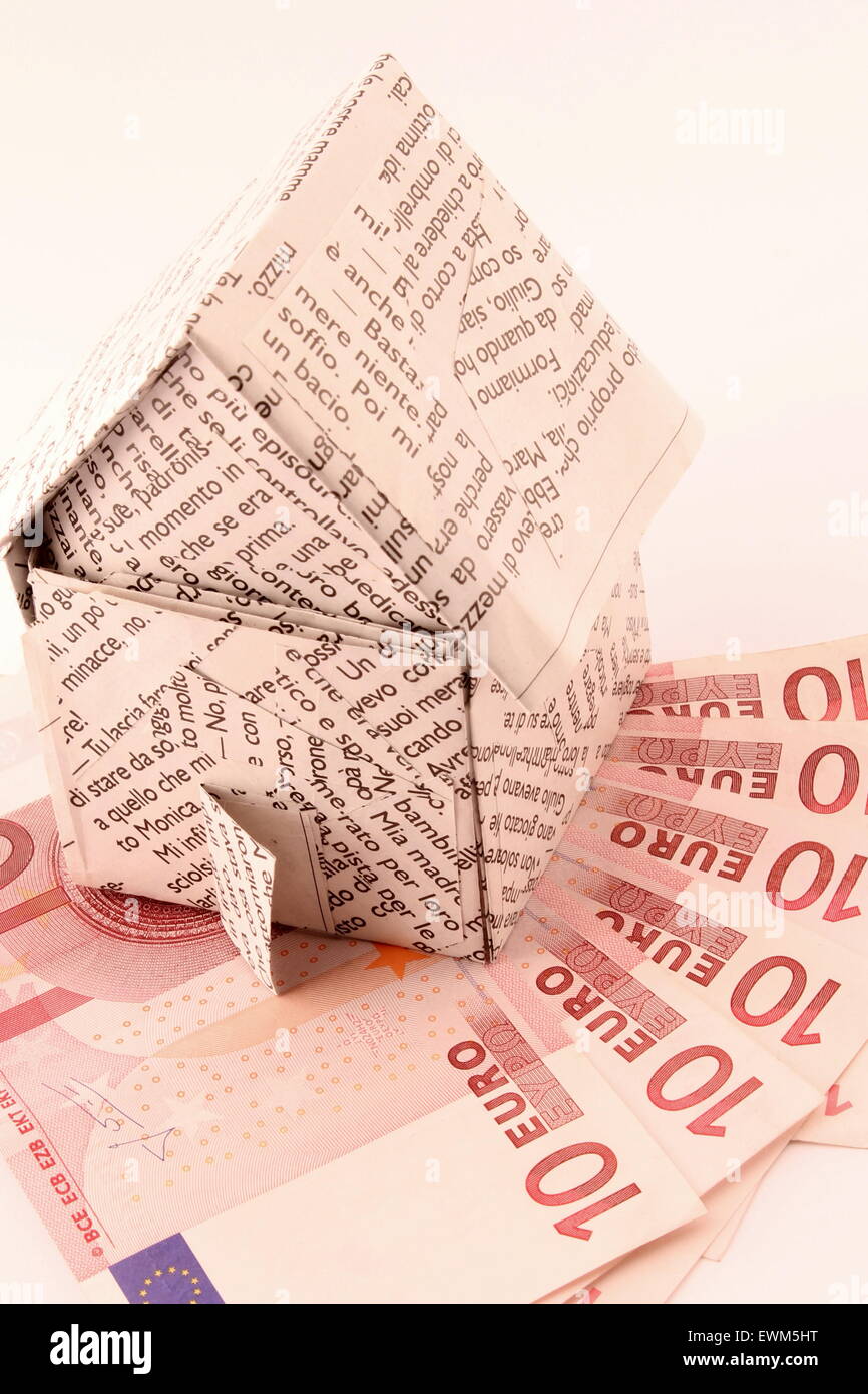 An isolated house, made with paper of a newspaper, Italian. Background ...
