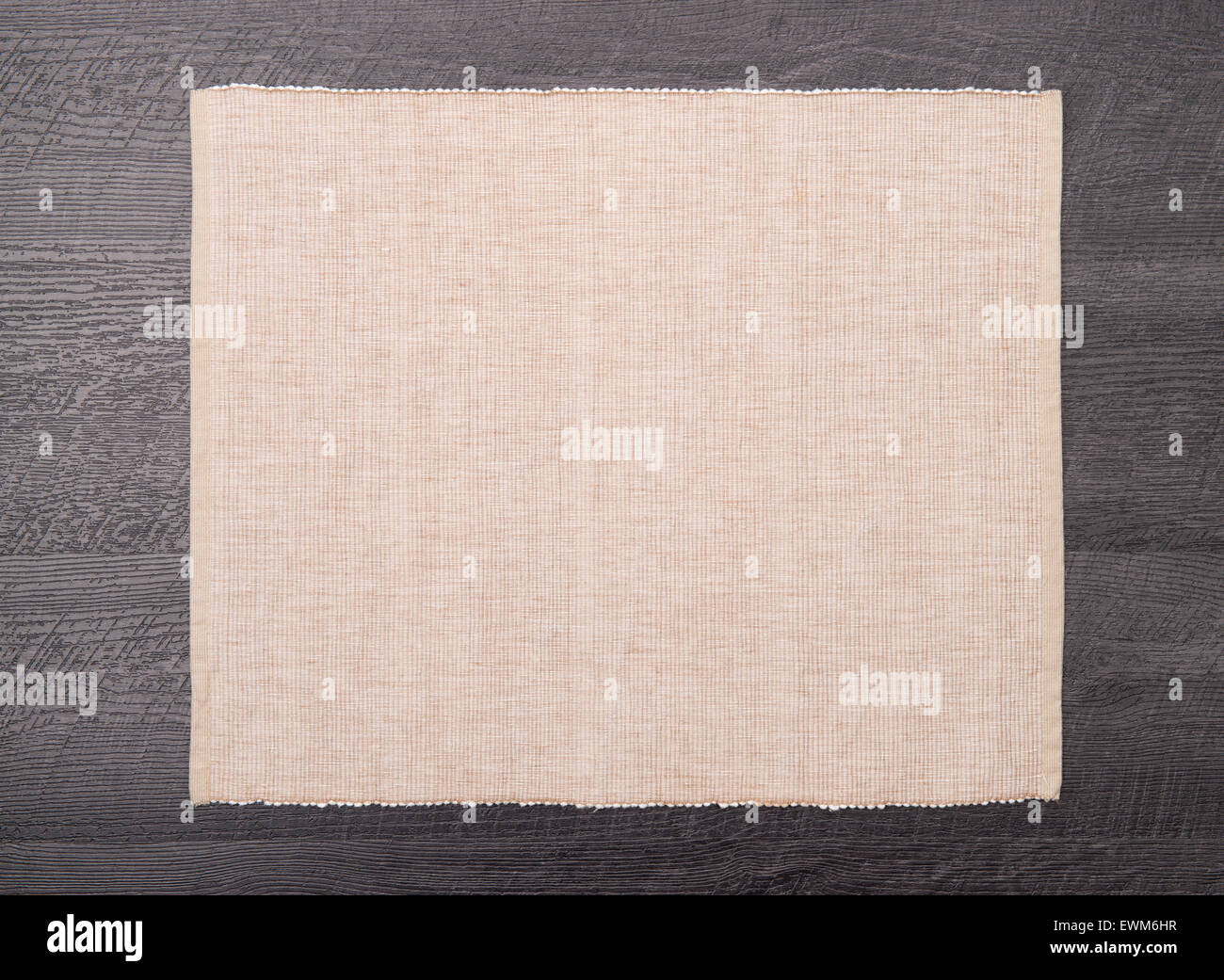 Place mat on wooden deck table Stock Photo - Alamy