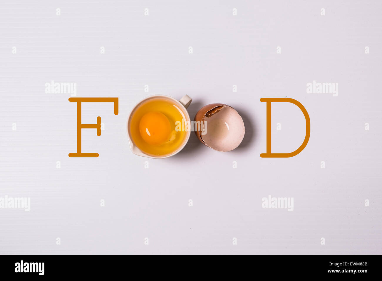 Egg in Cup spelling the Word Food Stock Photo - Alamy