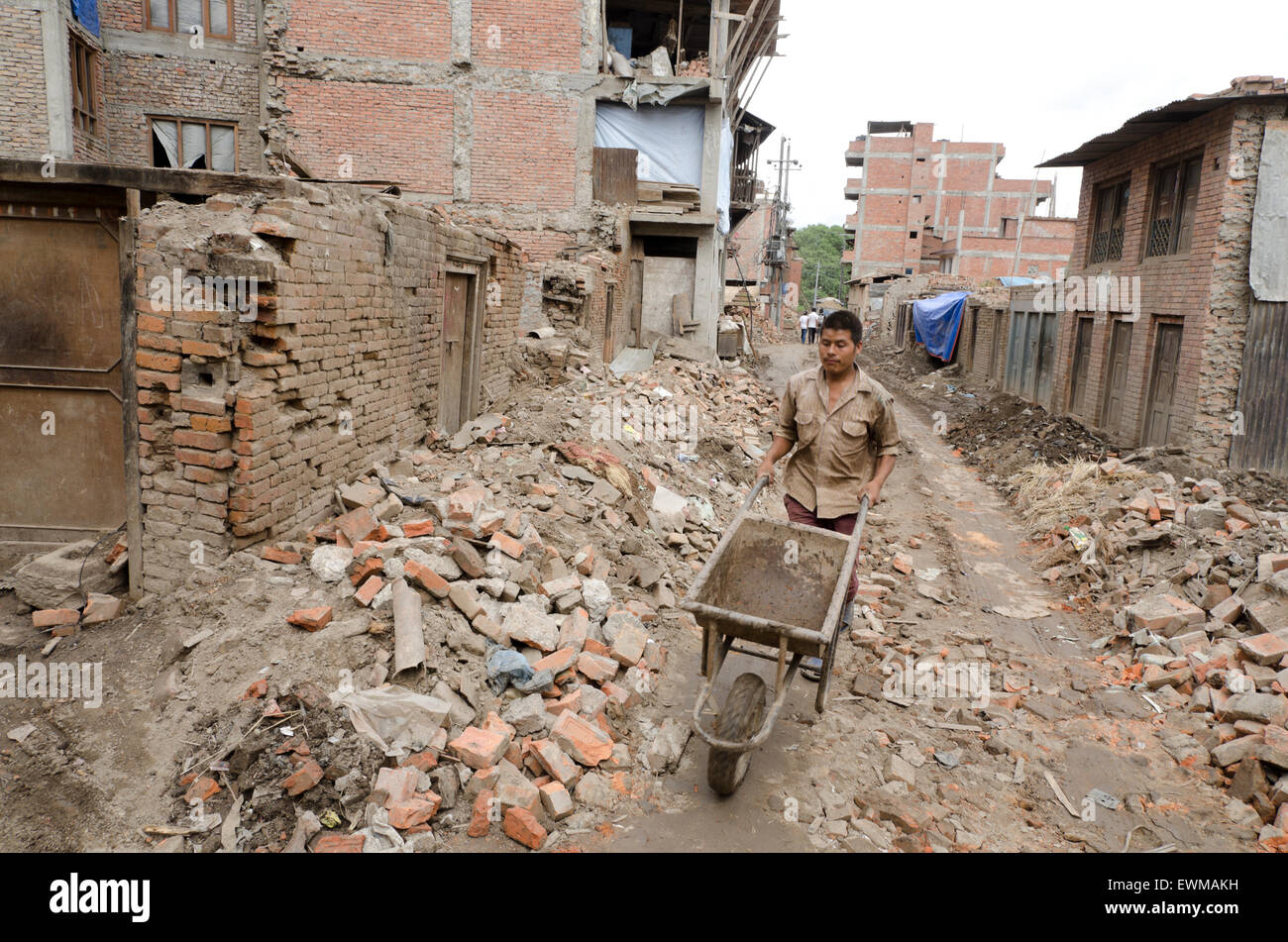 Nepal Earthquake: Cleaning debris from house in streets of Bhaktapur ...