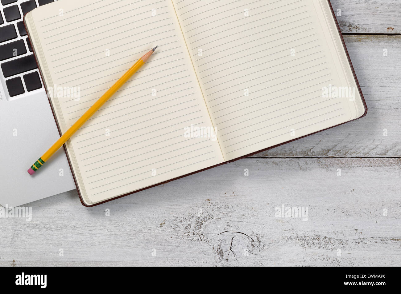 Laptop with paper hi-res stock photography and images - Alamy