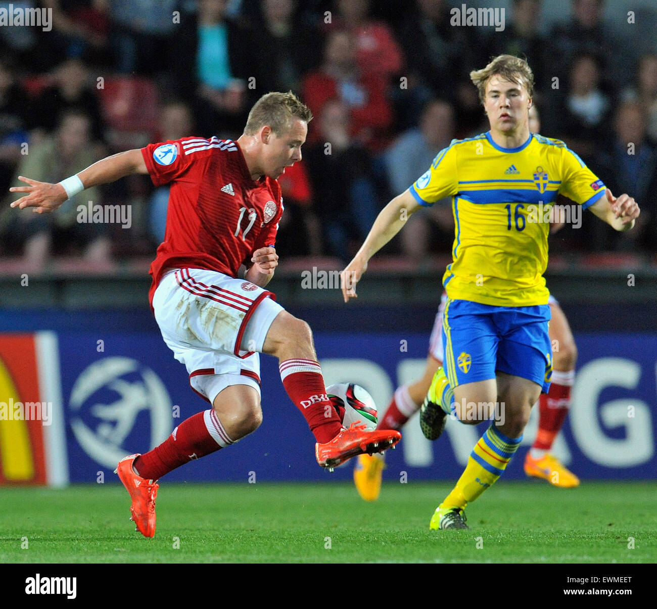 From left Uffe Bech of Denmark and Simon Tibbling of Sweden in action ...