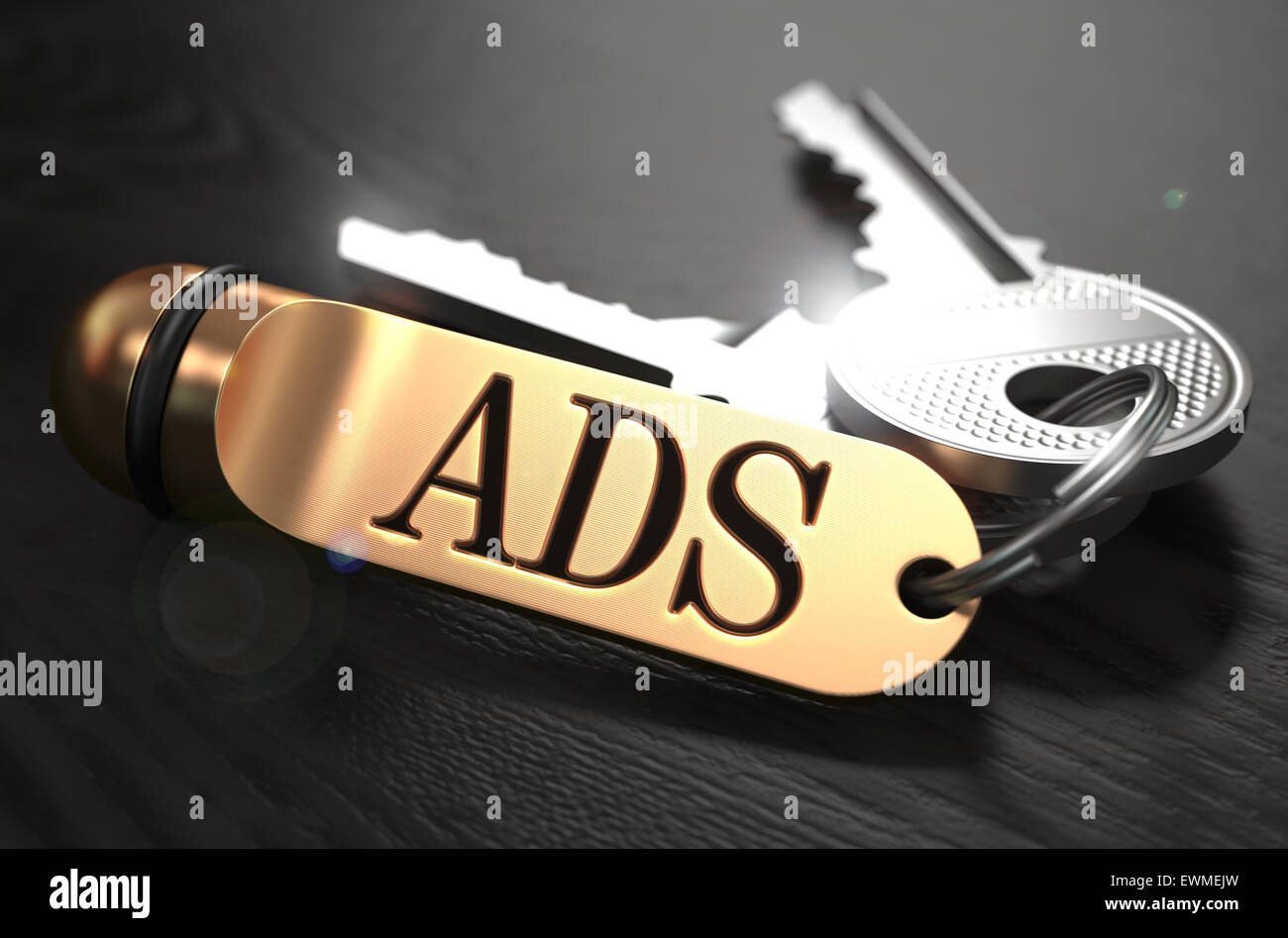 Keys with Word Ads on Golden Label Stock Photo - Alamy