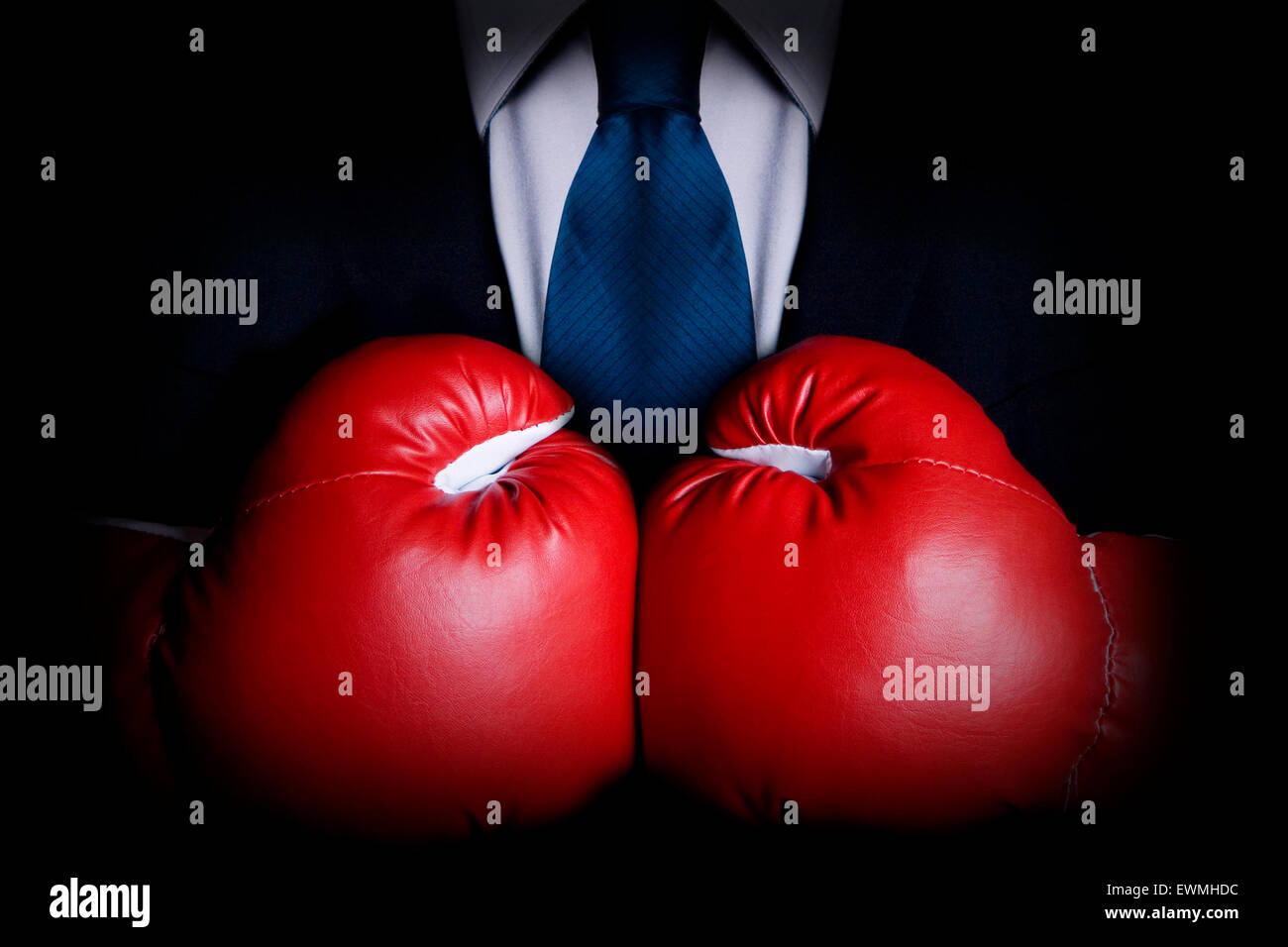 Stock image of person wearing business suit and boxing gloves Stock ...