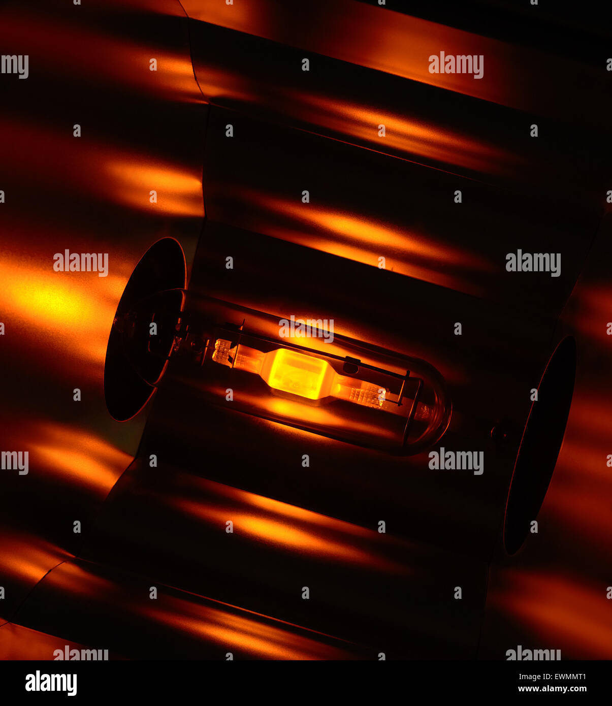 slight glowing light bulb and reflector in dark ambiance Stock Photo ...