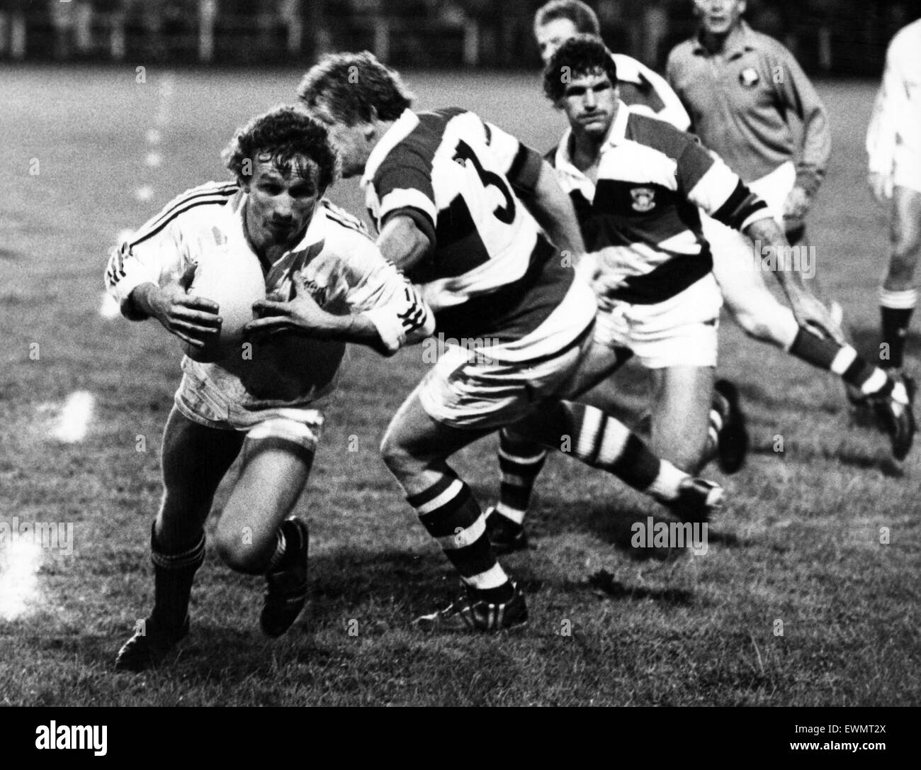 Swansea scrum half Alan Williams gets away from Pontypool's Graham ...