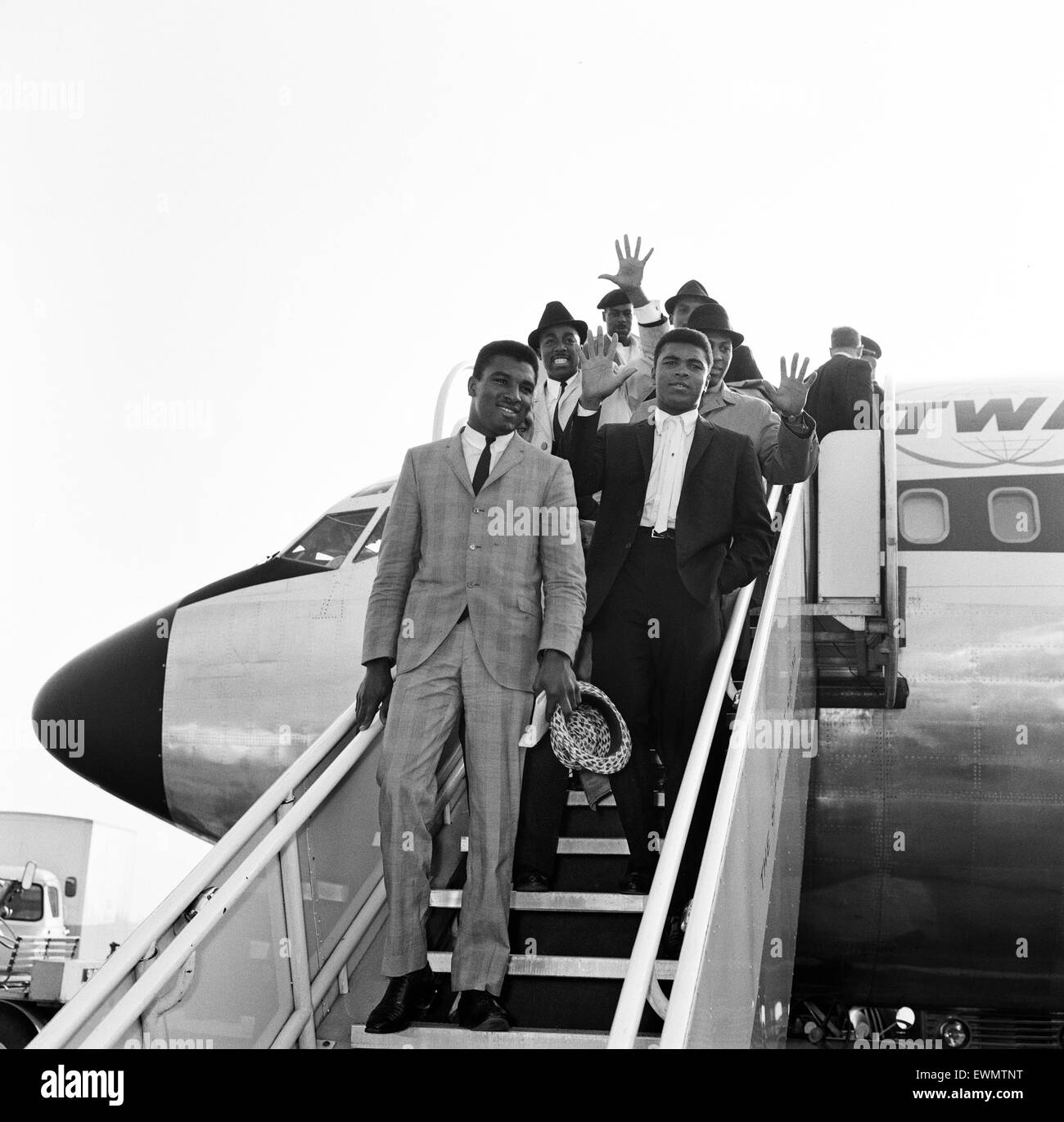 Cassius Clay aka (Muhammad Ali right) arriving at London Airport with ...