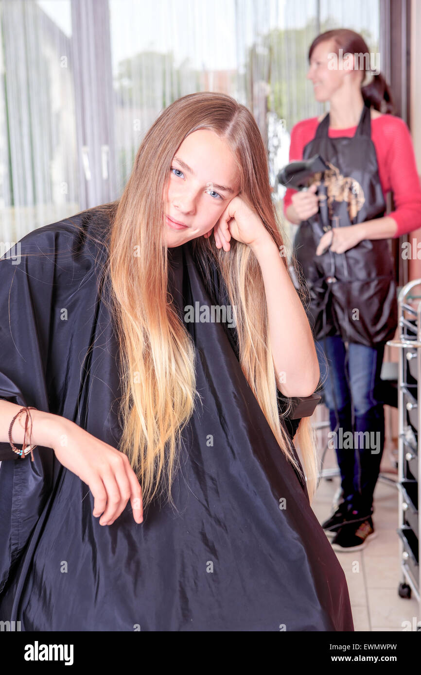 young girl in the hairdressers shop Stock Photo - Alamy