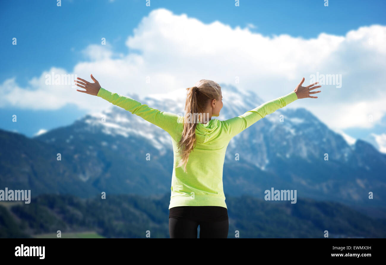happy woman in sportswear enjoying sun and freedom Stock Photo - Alamy