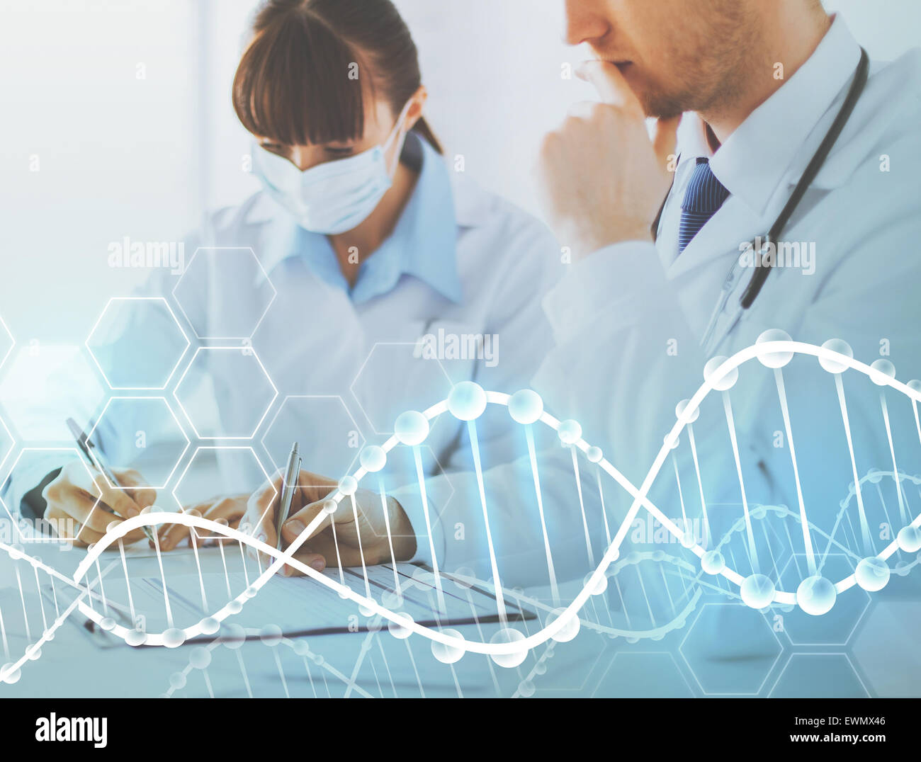 doctor and nurse writing dna test report Stock Photo - Alamy