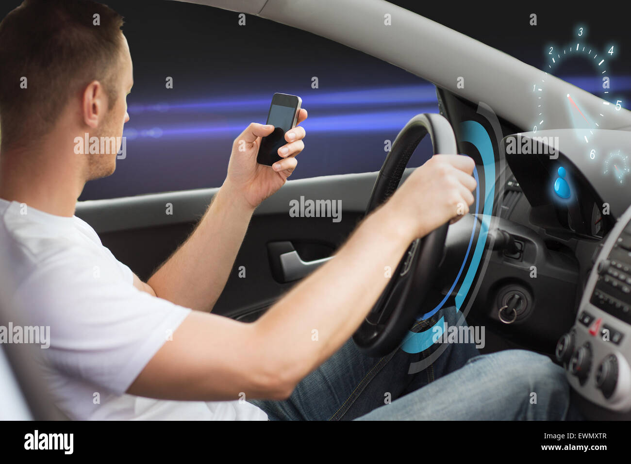 man looking to smart phone while driving car Stock Photo - Alamy