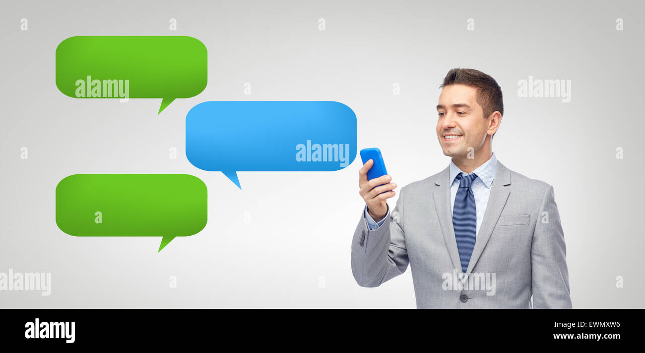 happy businessman texting message on smartphone Stock Photo - Alamy