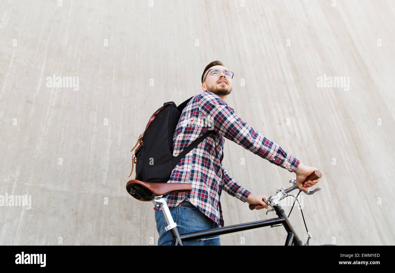 Teenager riding bike backpack hi-res stock photography and images - Alamy