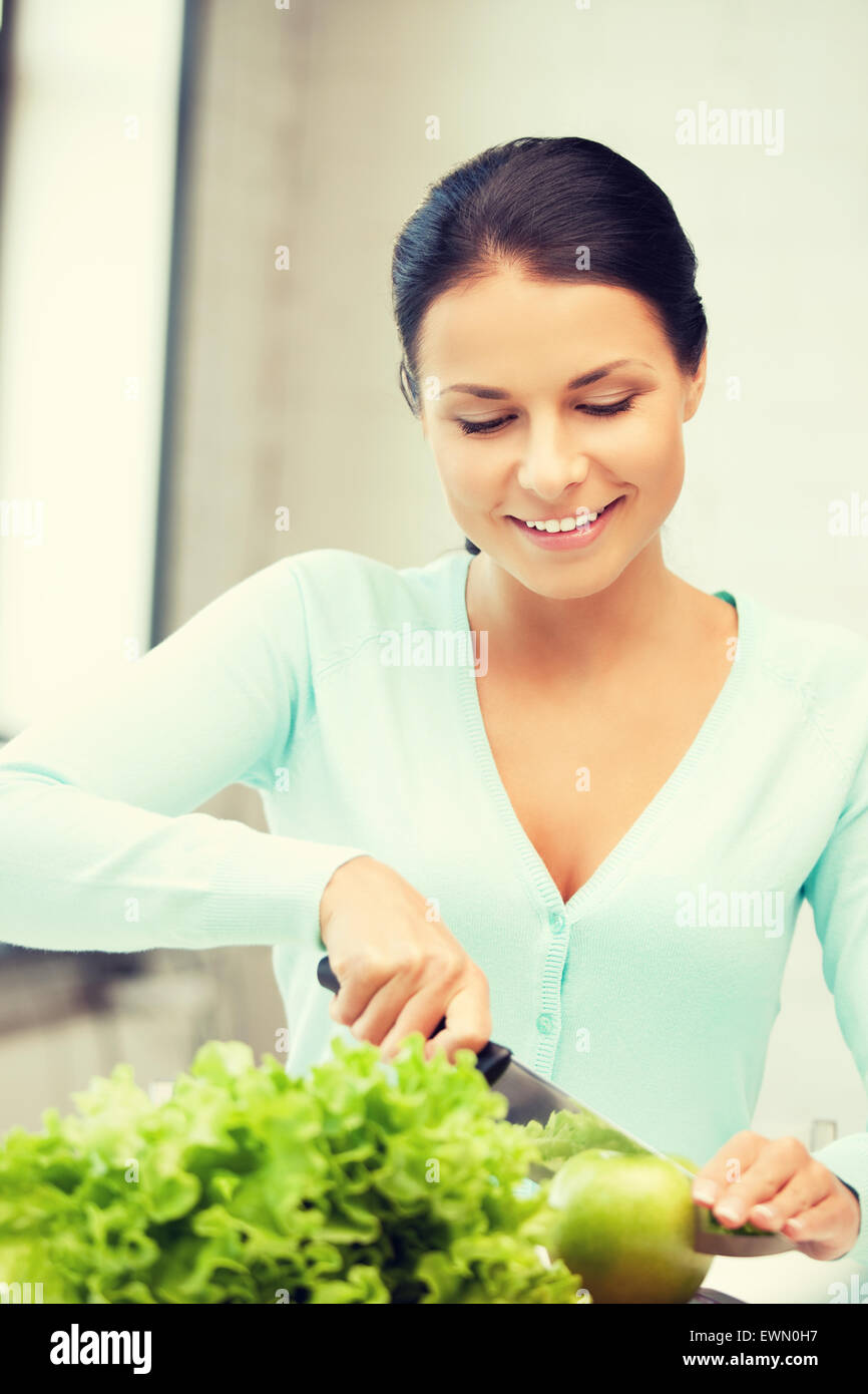 beautiful woman in the kitchen Stock Photo - Alamy