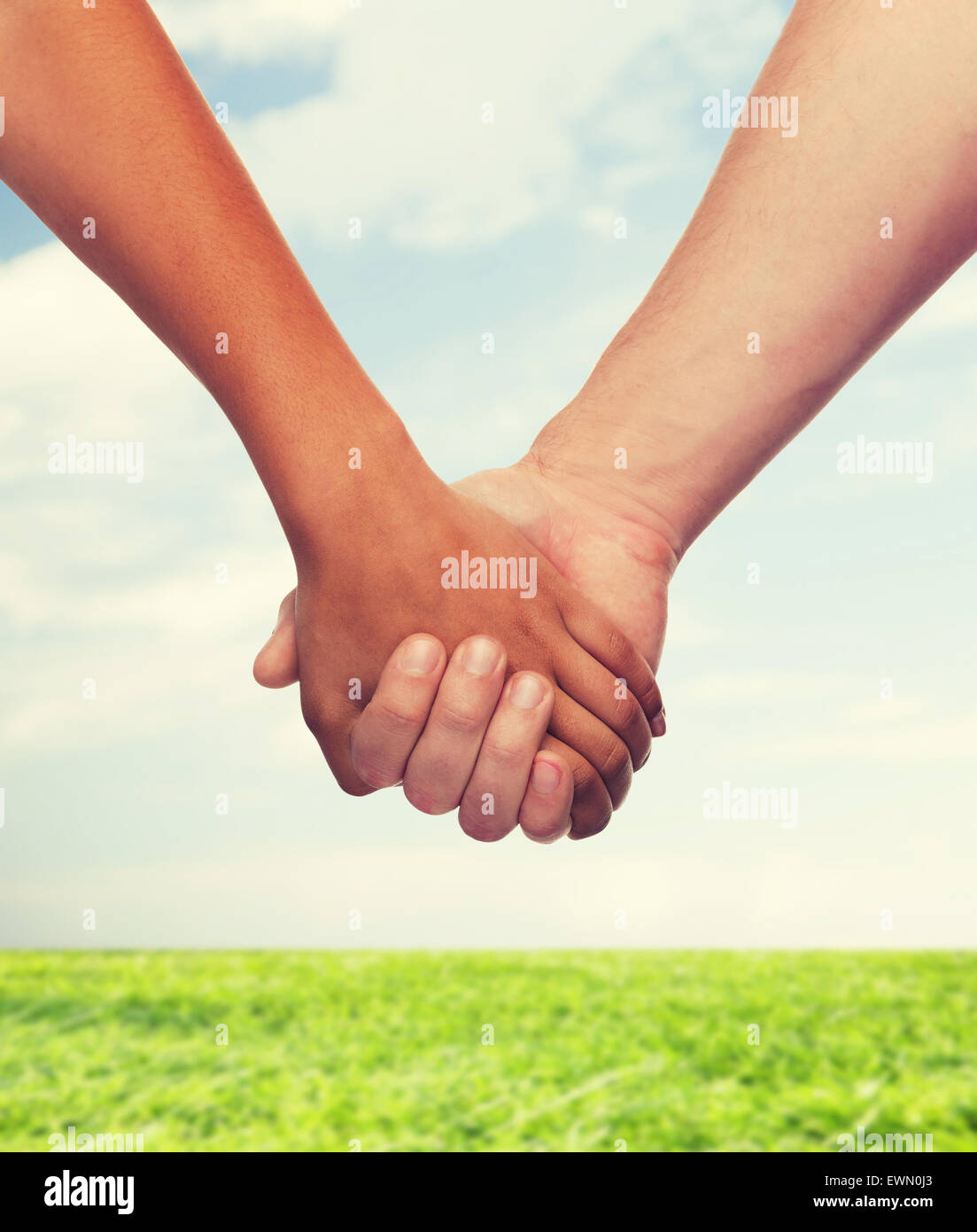 woman and man holding hands Stock Photo - Alamy