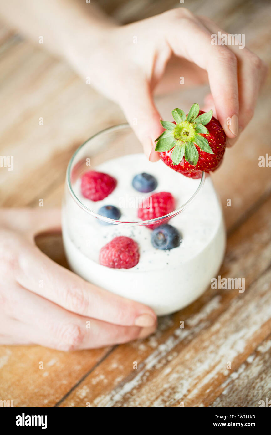 Woman strawberry yogurt hi-res stock photography and images - Alamy