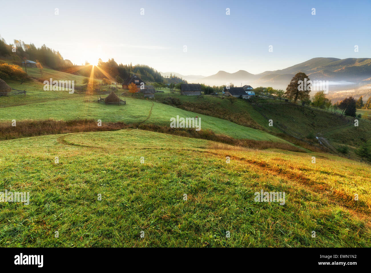 Fall colors mountain hill at sunny morning Stock Photo - Alamy